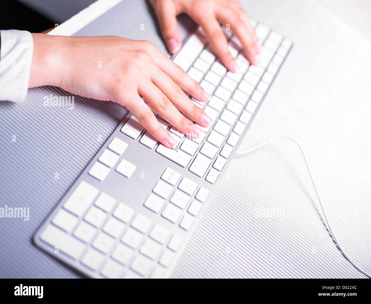 Business Secretary Typing on Computer Keyboard Stock Photo - Alamy