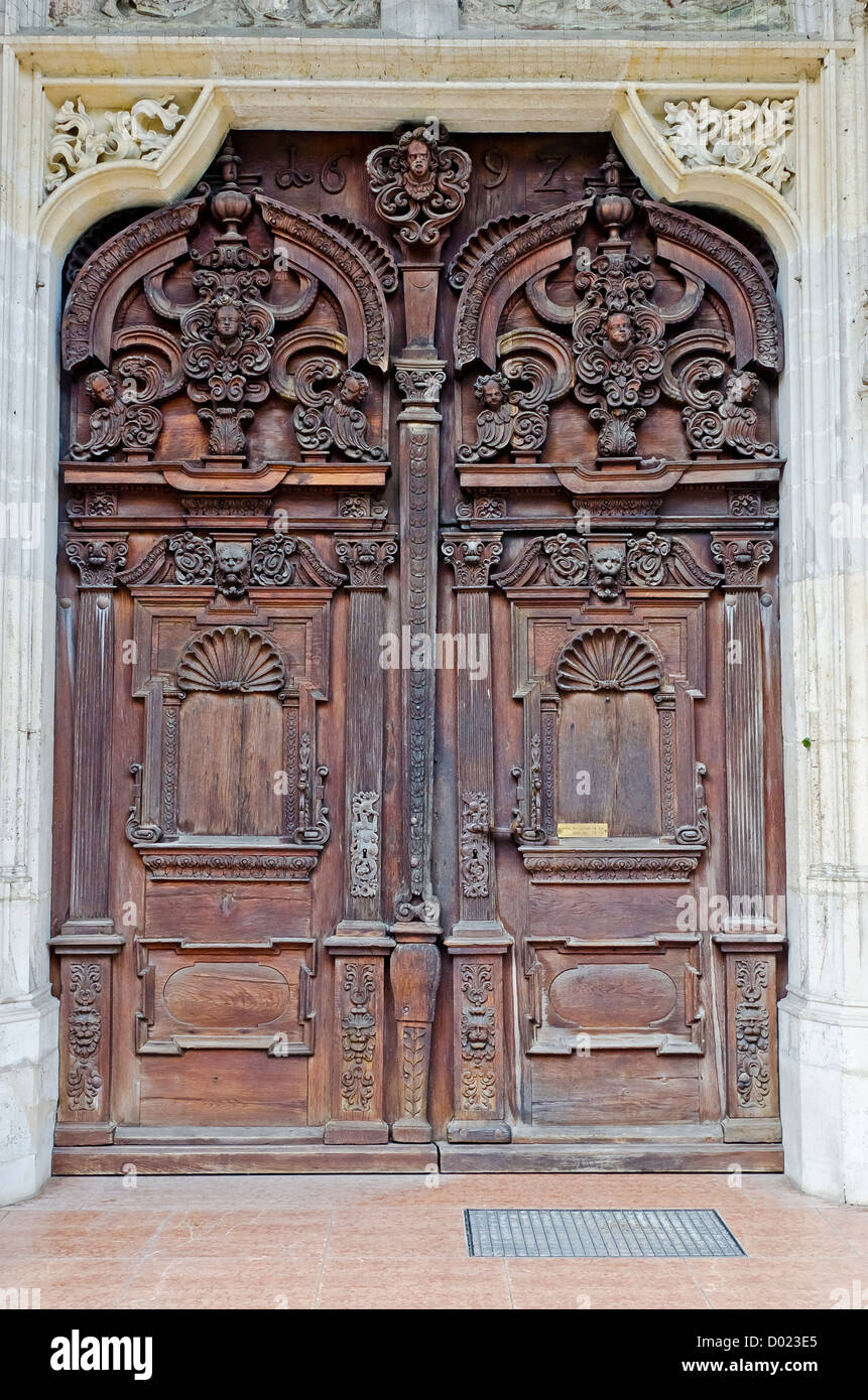 Huge ornate wooden doors Stock Photo - Alamy