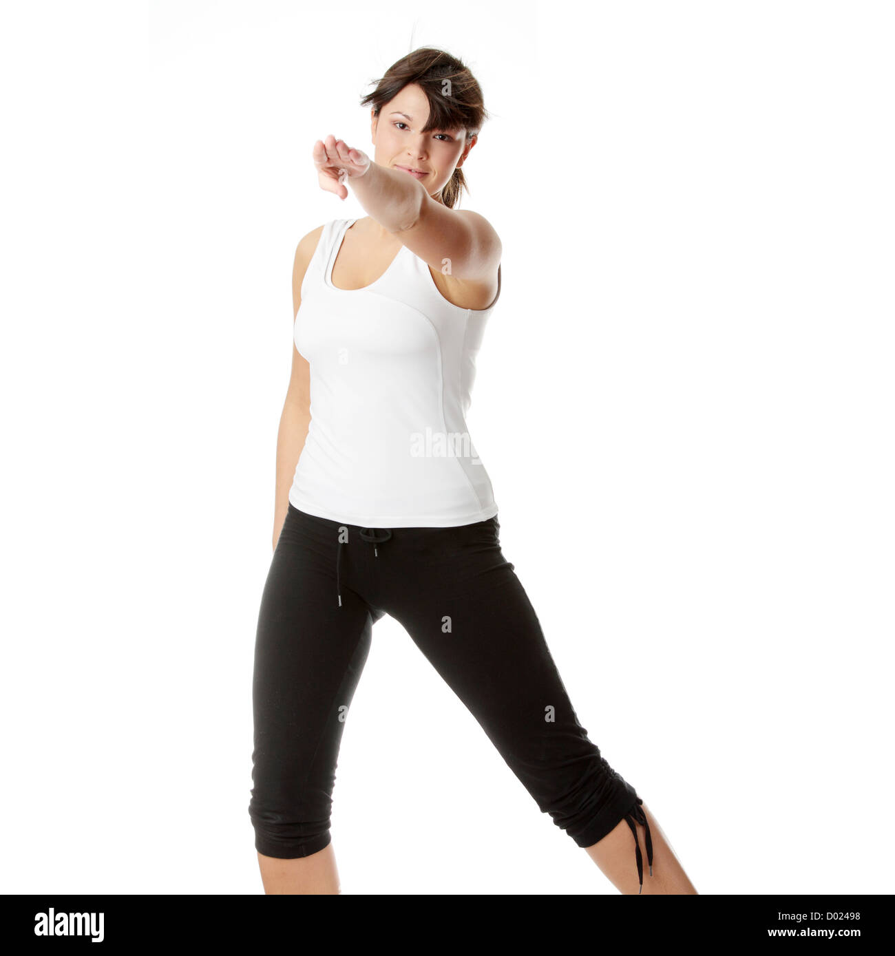 Physical training (aerobics) of beautiful young woman isolated on white ...