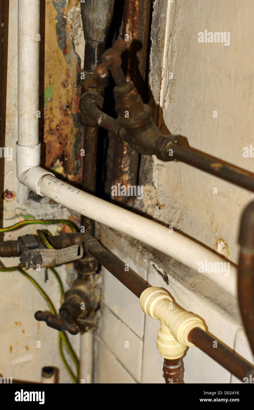 Old rusty kitchen pipes Stock Photo - Alamy