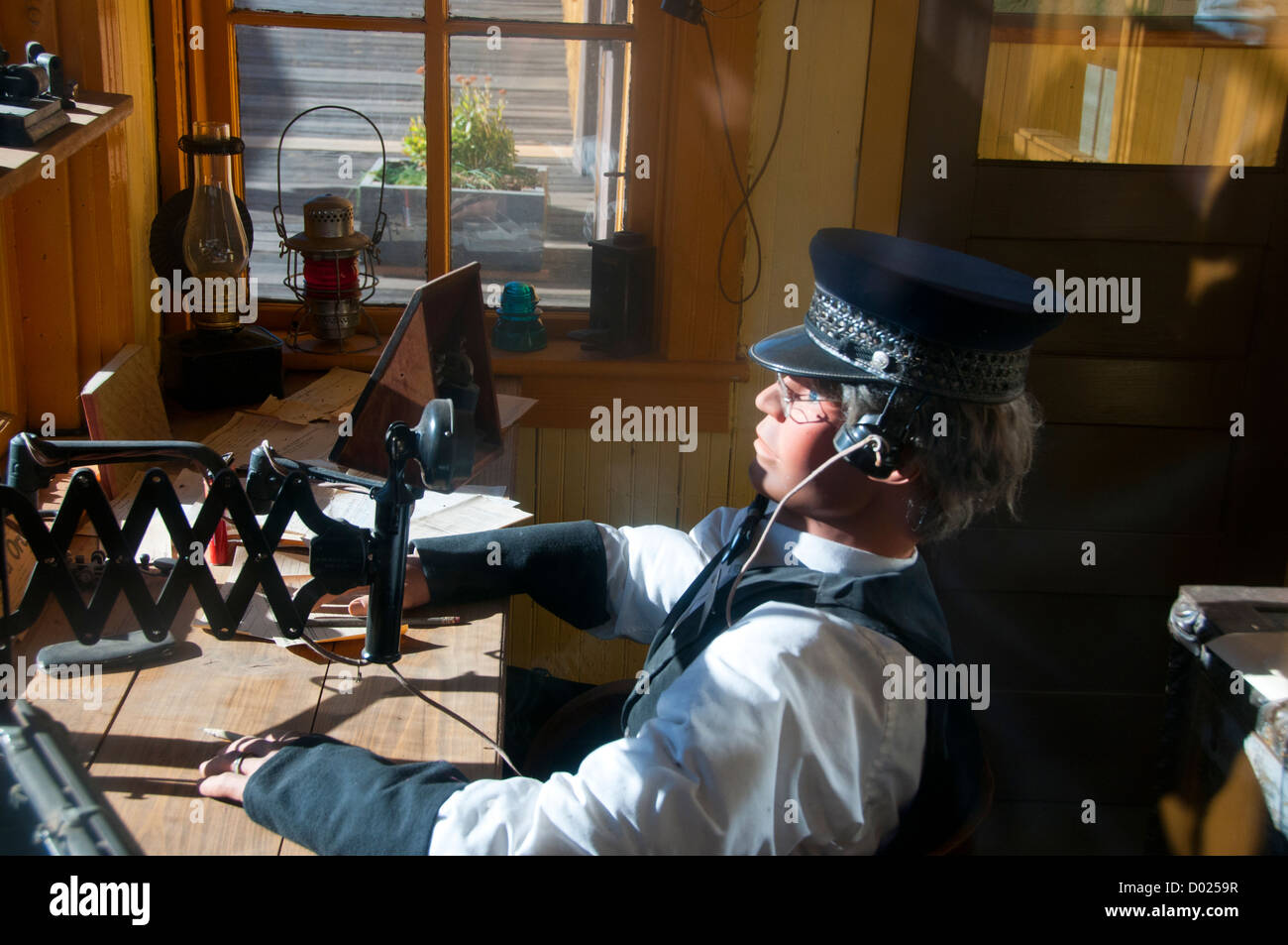Train dispatch dispatcher mannequin sitting at desk Stock Photo - Alamy