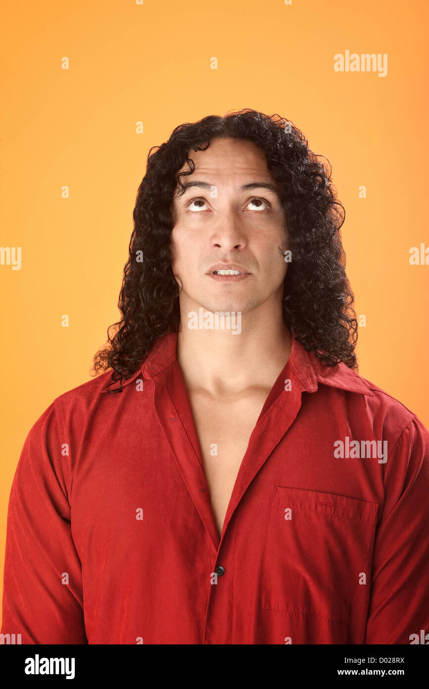 Native American man rolls his eyes upwards Stock Photo - Alamy