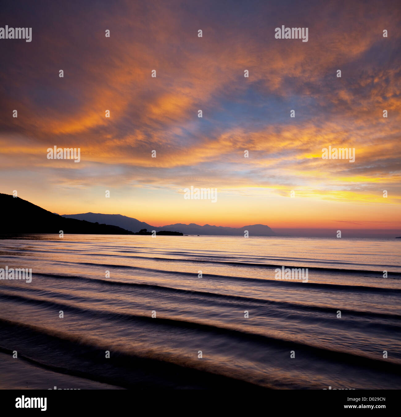 Sea on sunset Stock Photo - Alamy