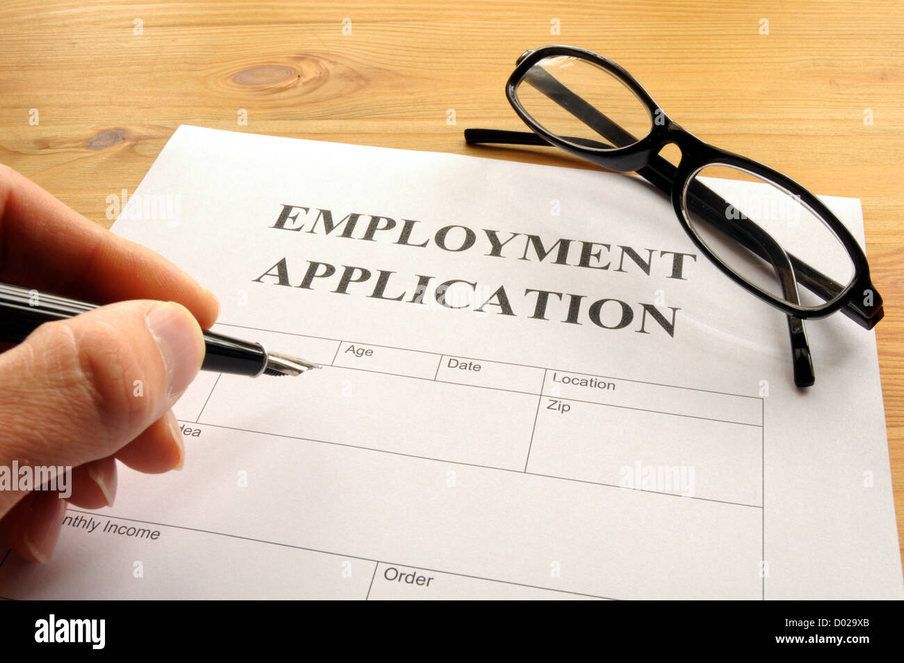 employment application form on desk showing job search concept Stock ...