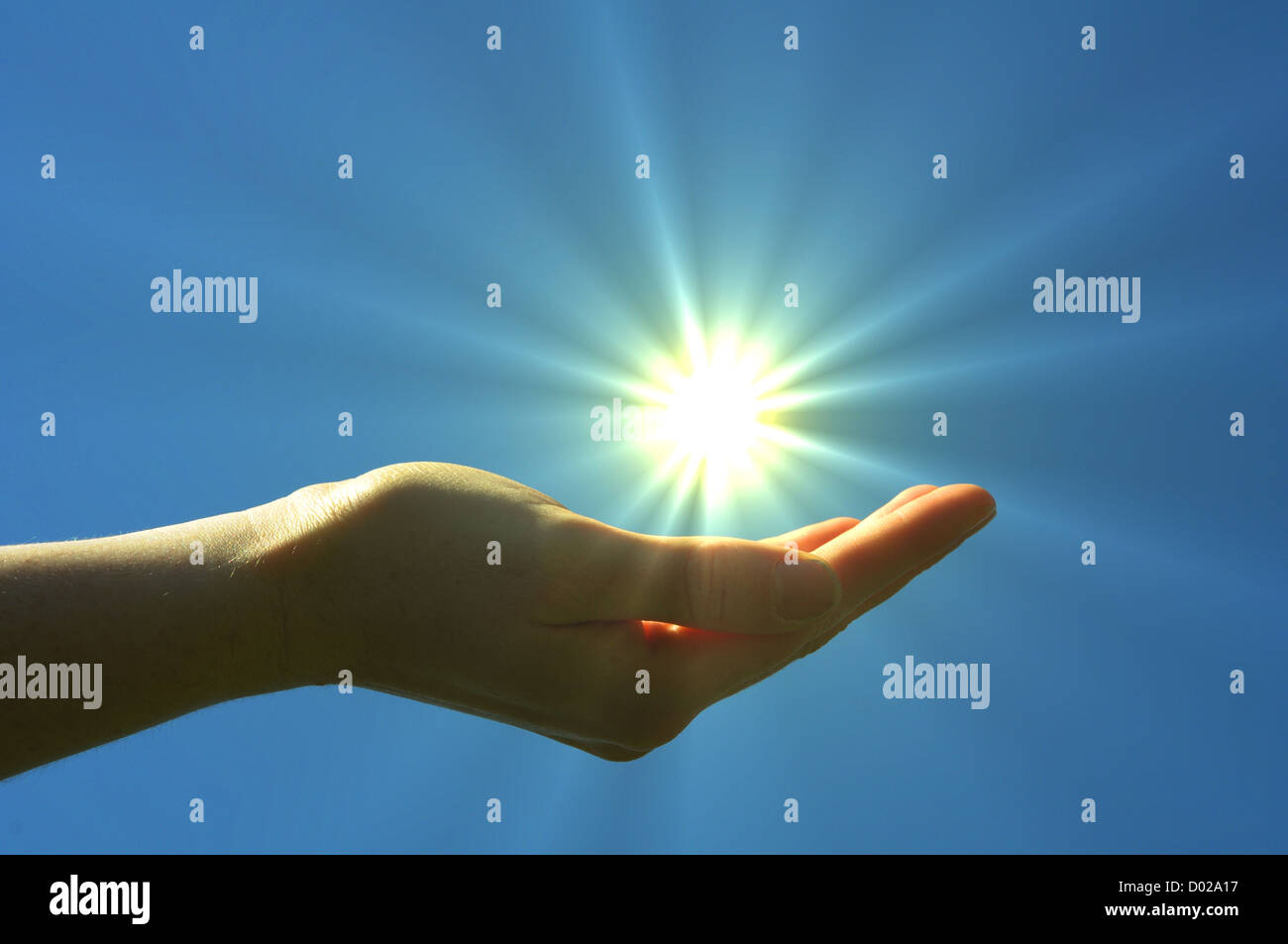hand sun and blue sky showing hope peace or freedom concept Stock Photo ...