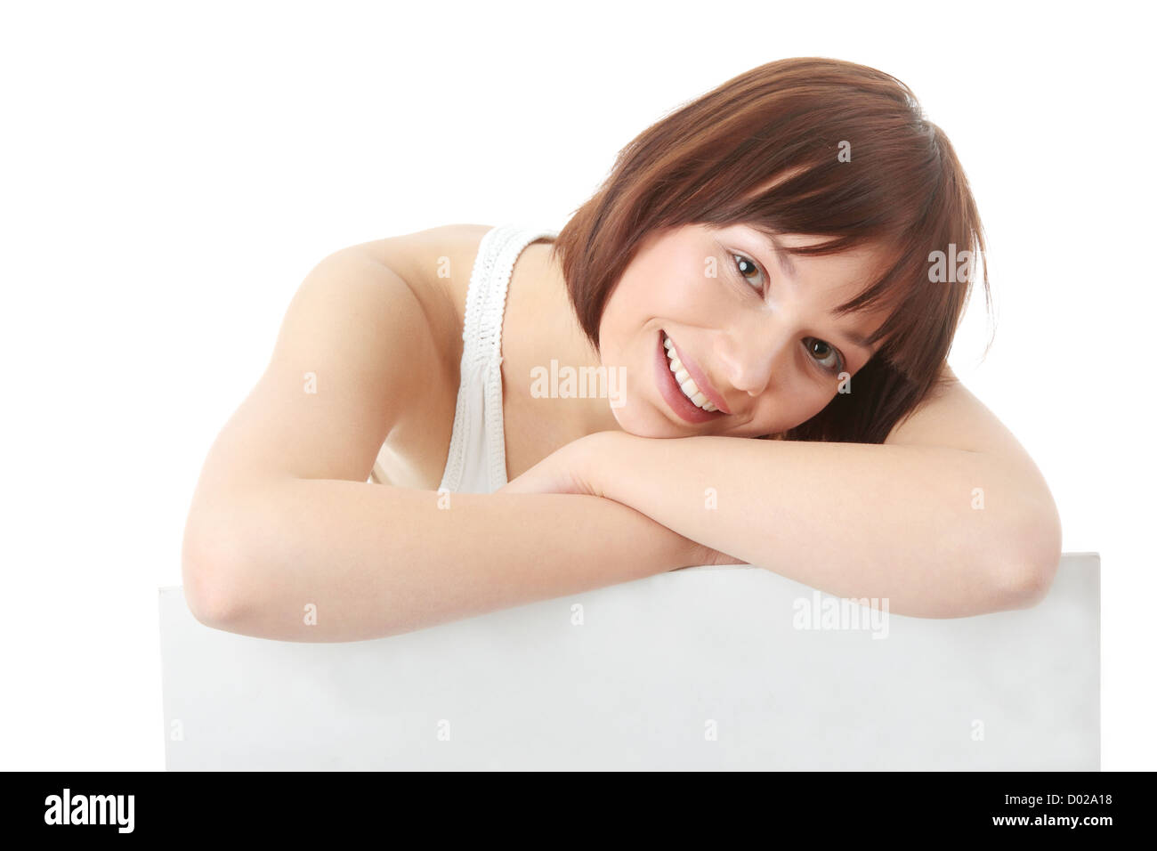 A pretty young woman holding a blank sign Stock Photo - Alamy