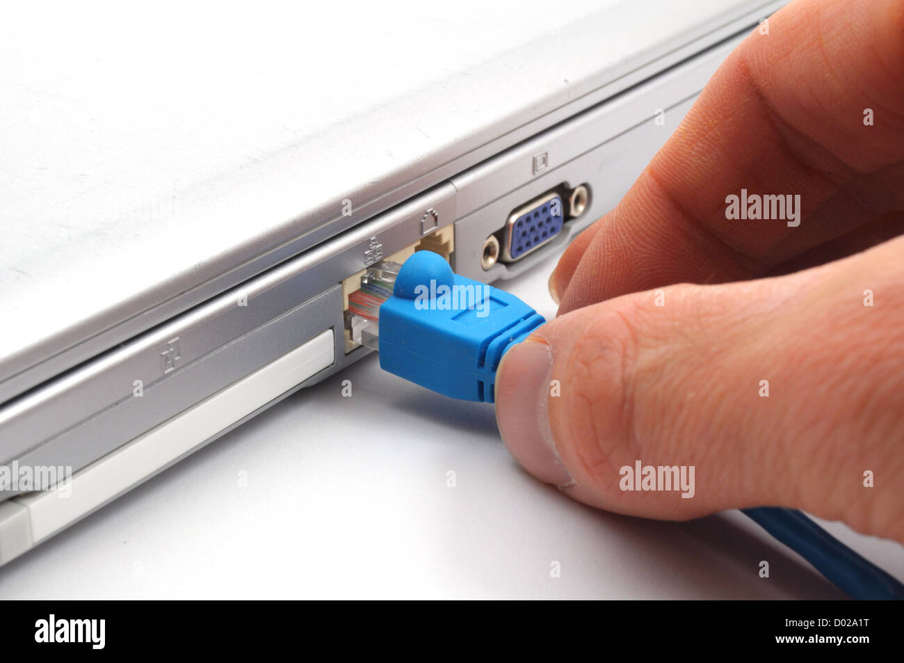 hand laptop and network connector showing lan or internet communication ...