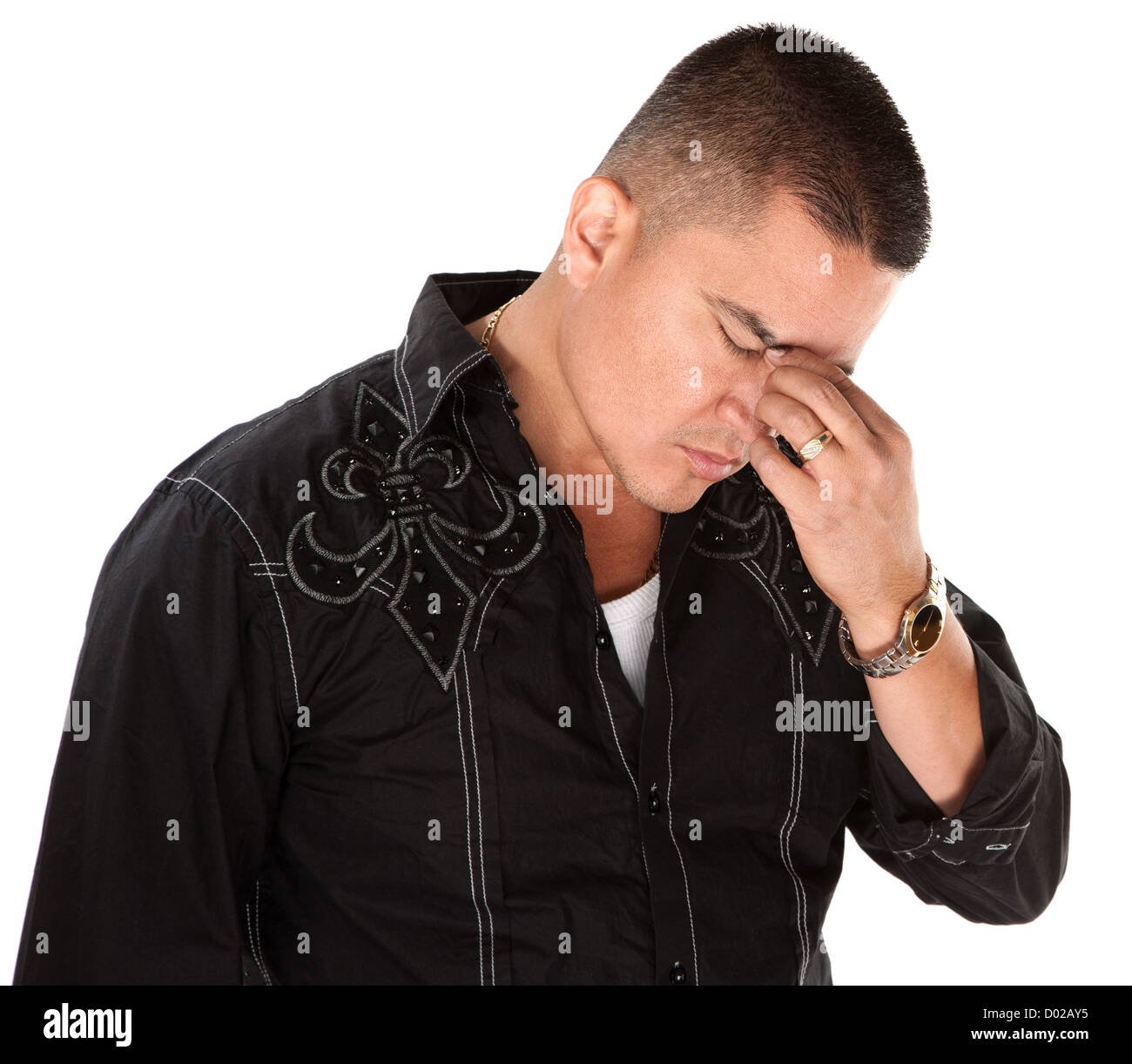 Native American man thinking deeply with fingers on eyebrows Stock ...