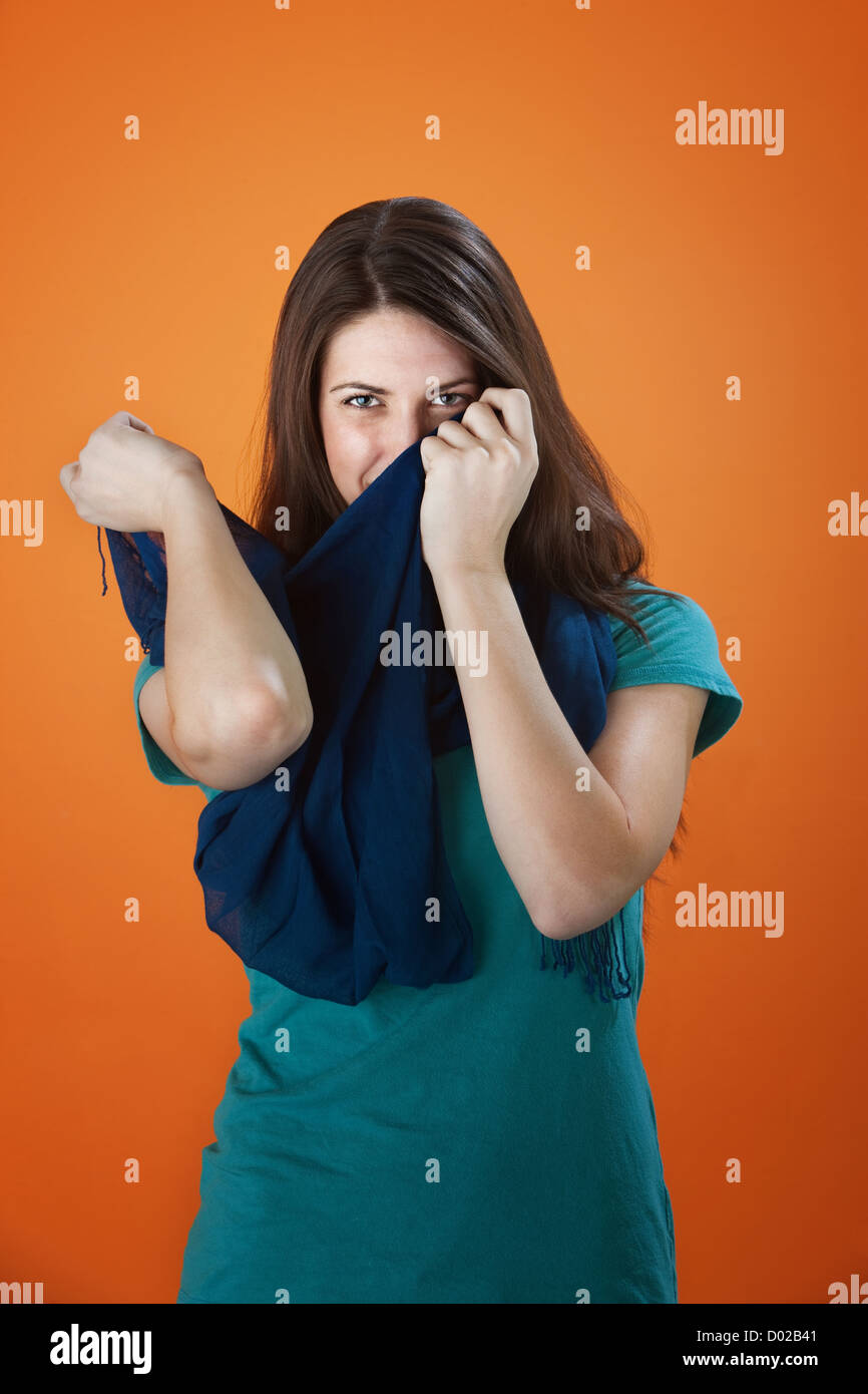 Cover nose with scarf hi-res stock photography and images - Alamy