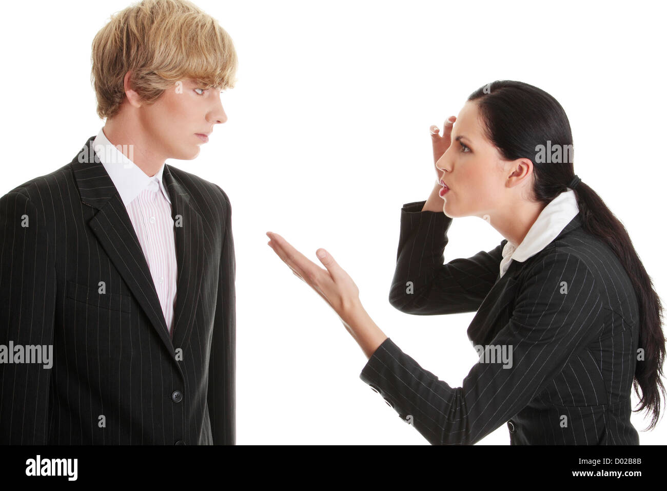 Work Colleagues arguing (woman shouting on man), isolated on white ...