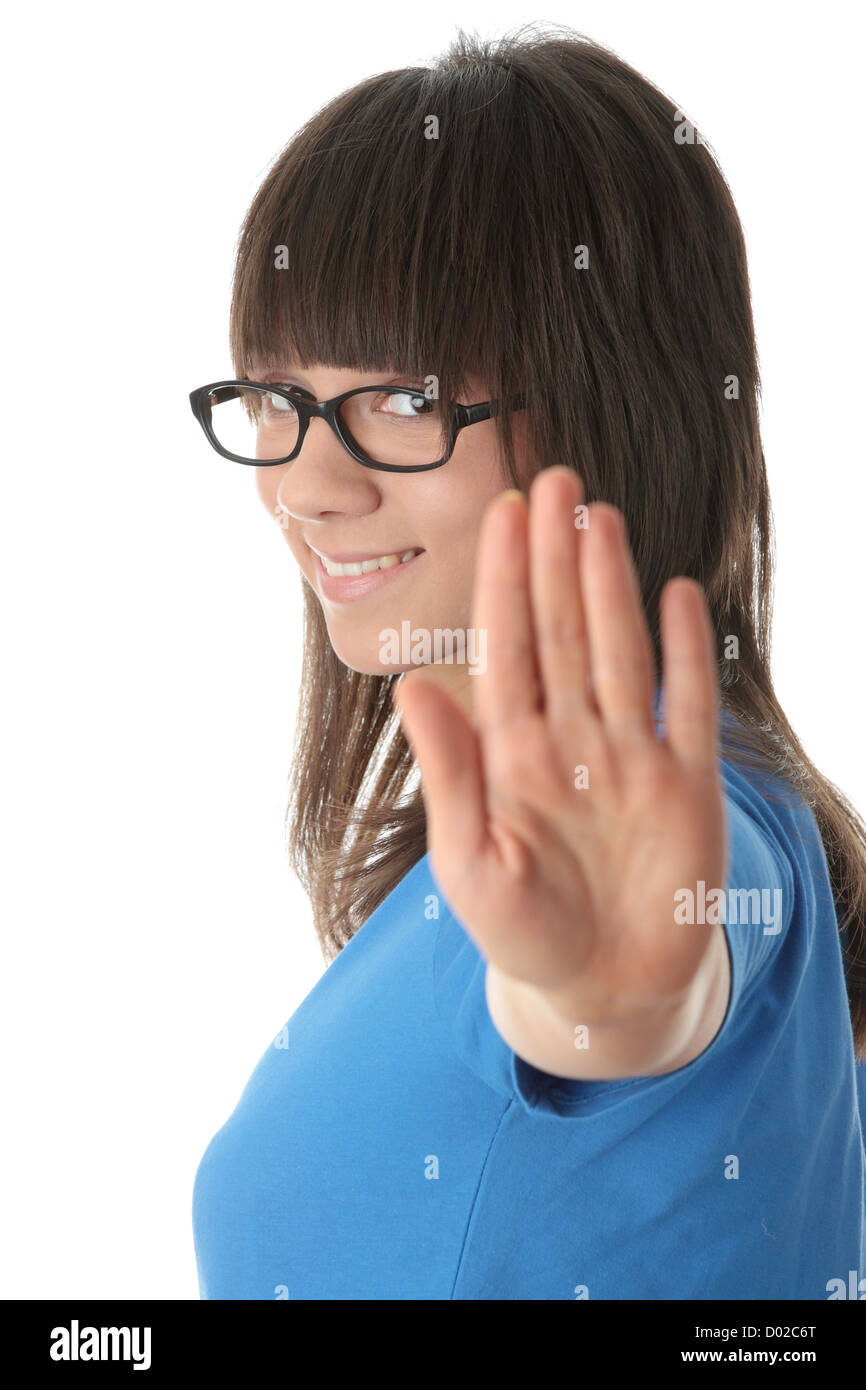 Teen girl gesturing to stop, isolated on white Stock Photo - Alamy