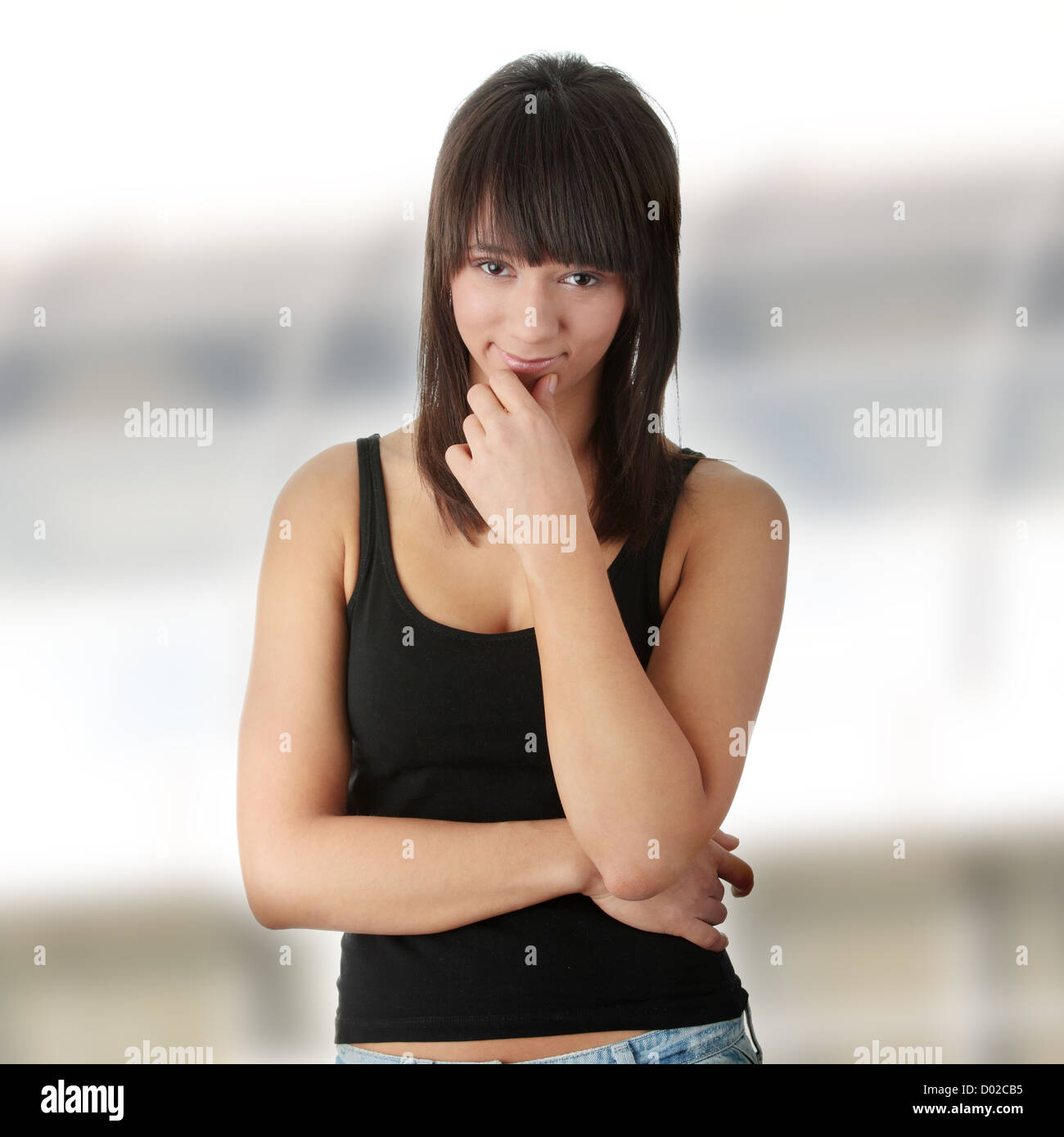 Young beautiful woman thinking Stock Photo - Alamy