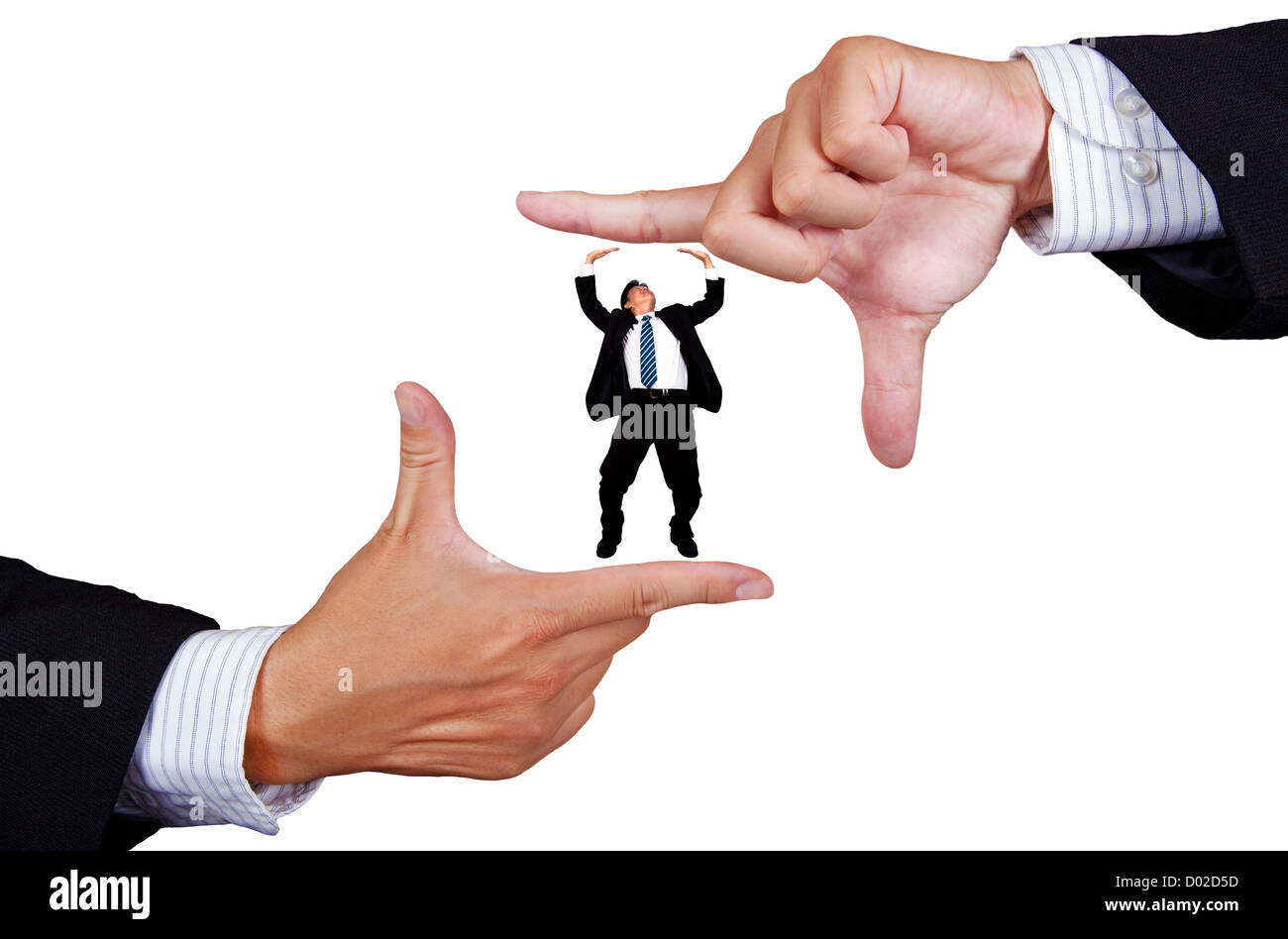Young businessman making a hand frame isolated on white background ...