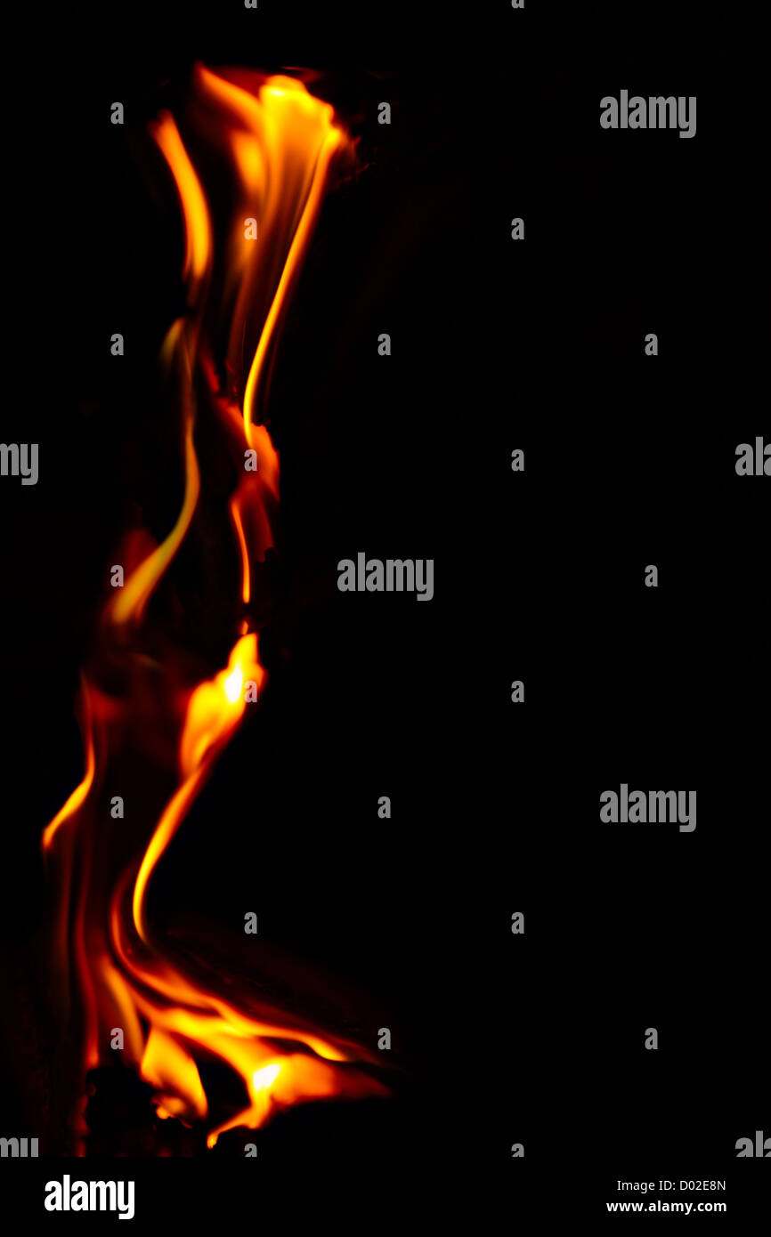 Abstract background. Fire raising upwards on a dark background Stock ...