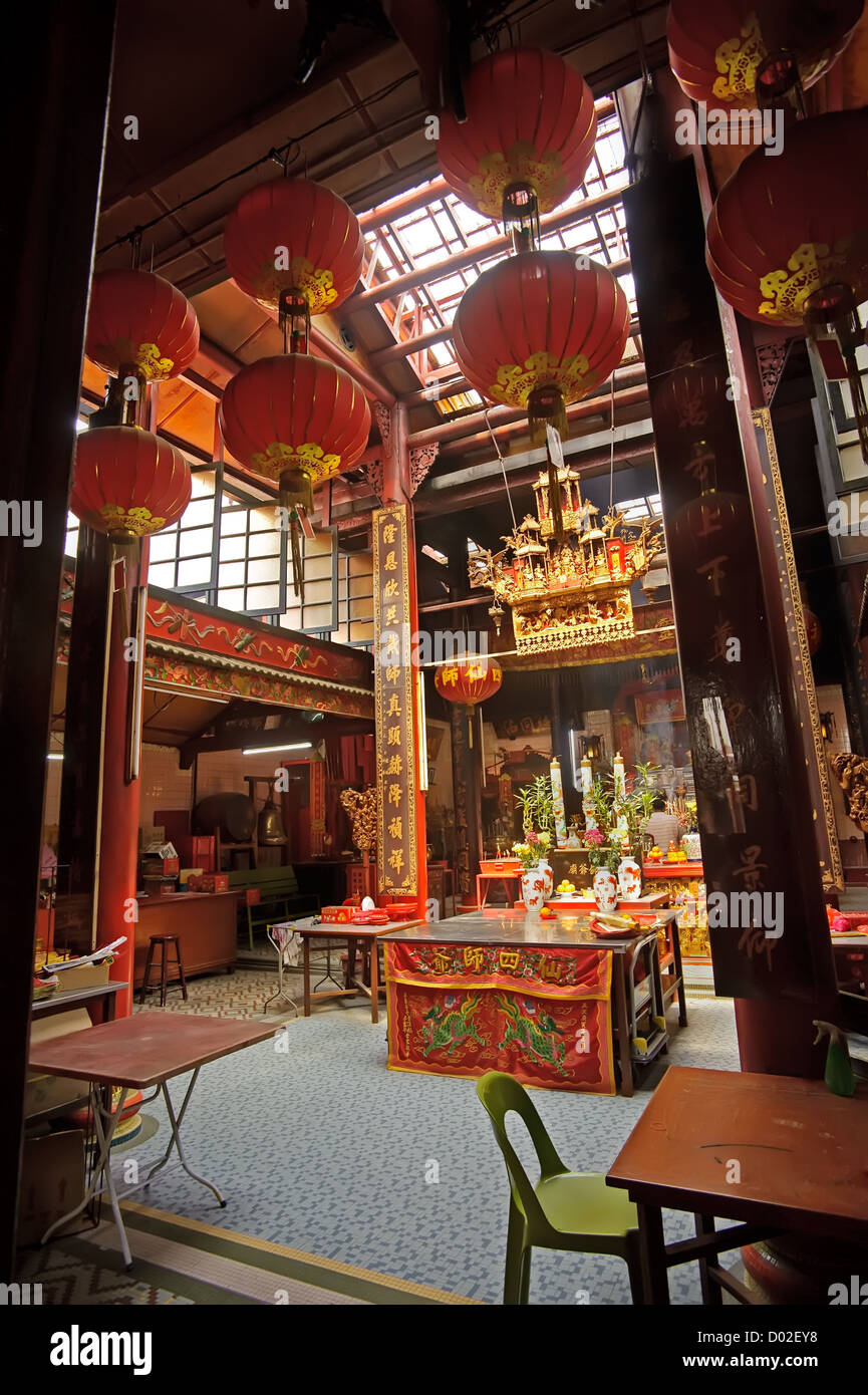 Chinese Buddhism temple interior with suspension of red lanterns and ...