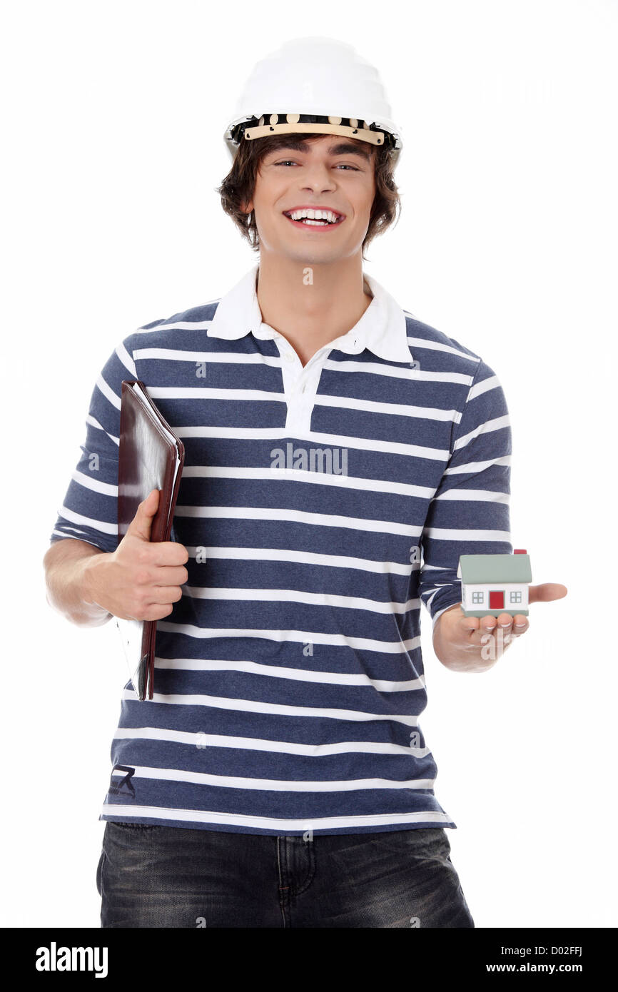 Young man with house's model Stock Photo - Alamy