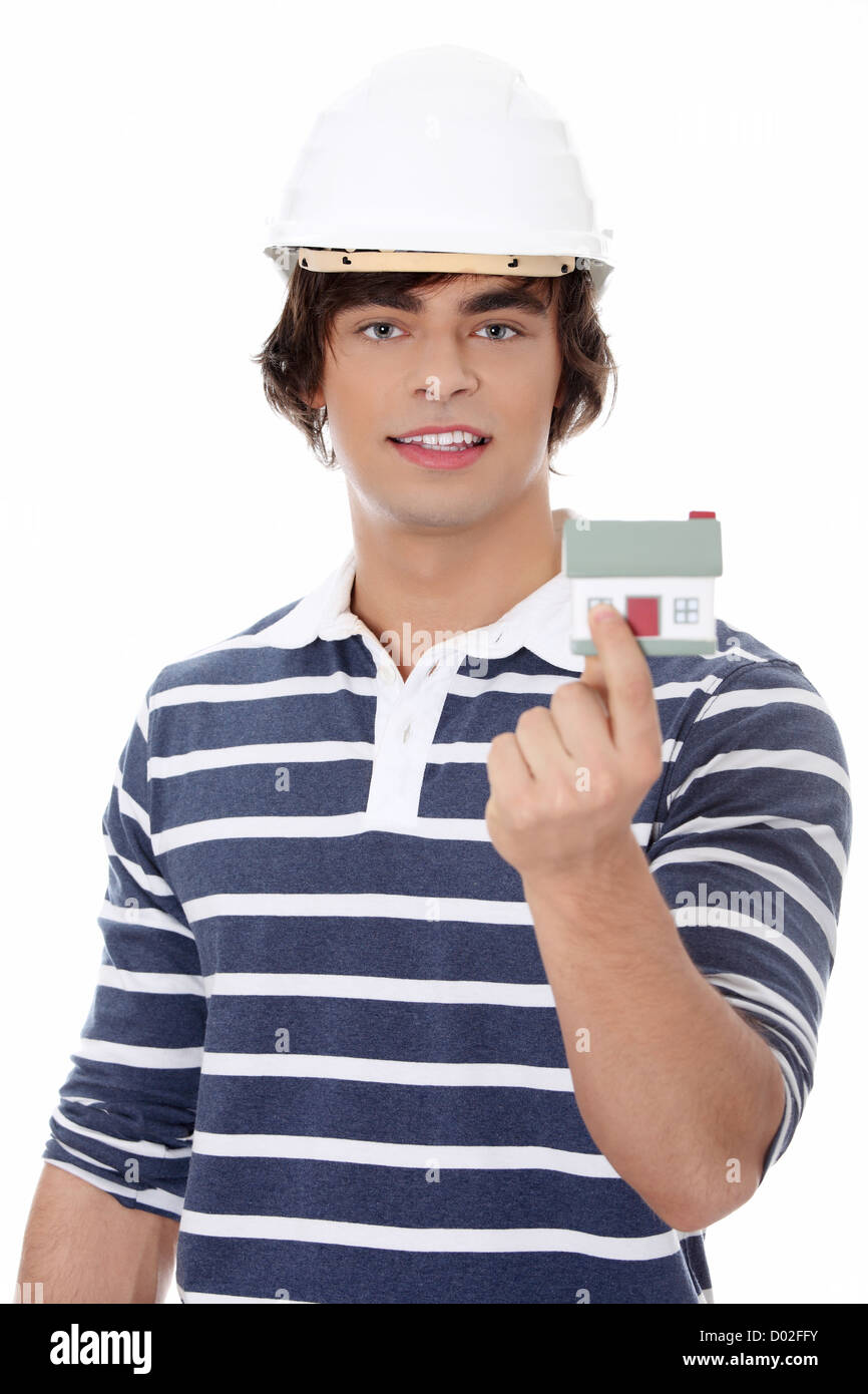 Young man with house's model Stock Photo - Alamy