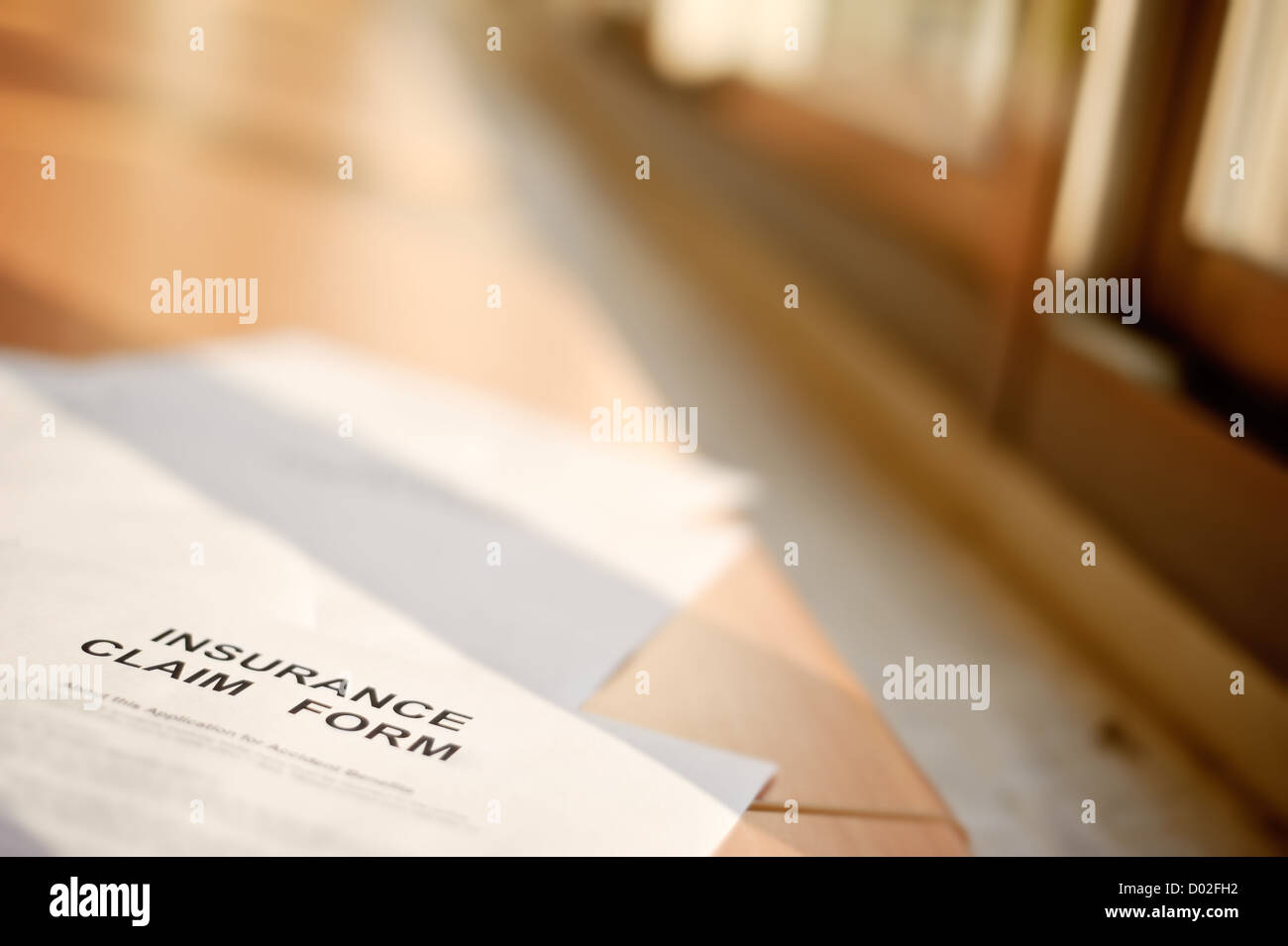 Insurance claim form paper on desk, shallow DOF Stock Photo - Alamy