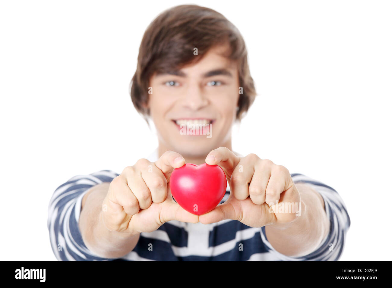 Young man with heart. Isolated on white background Stock Photo - Alamy