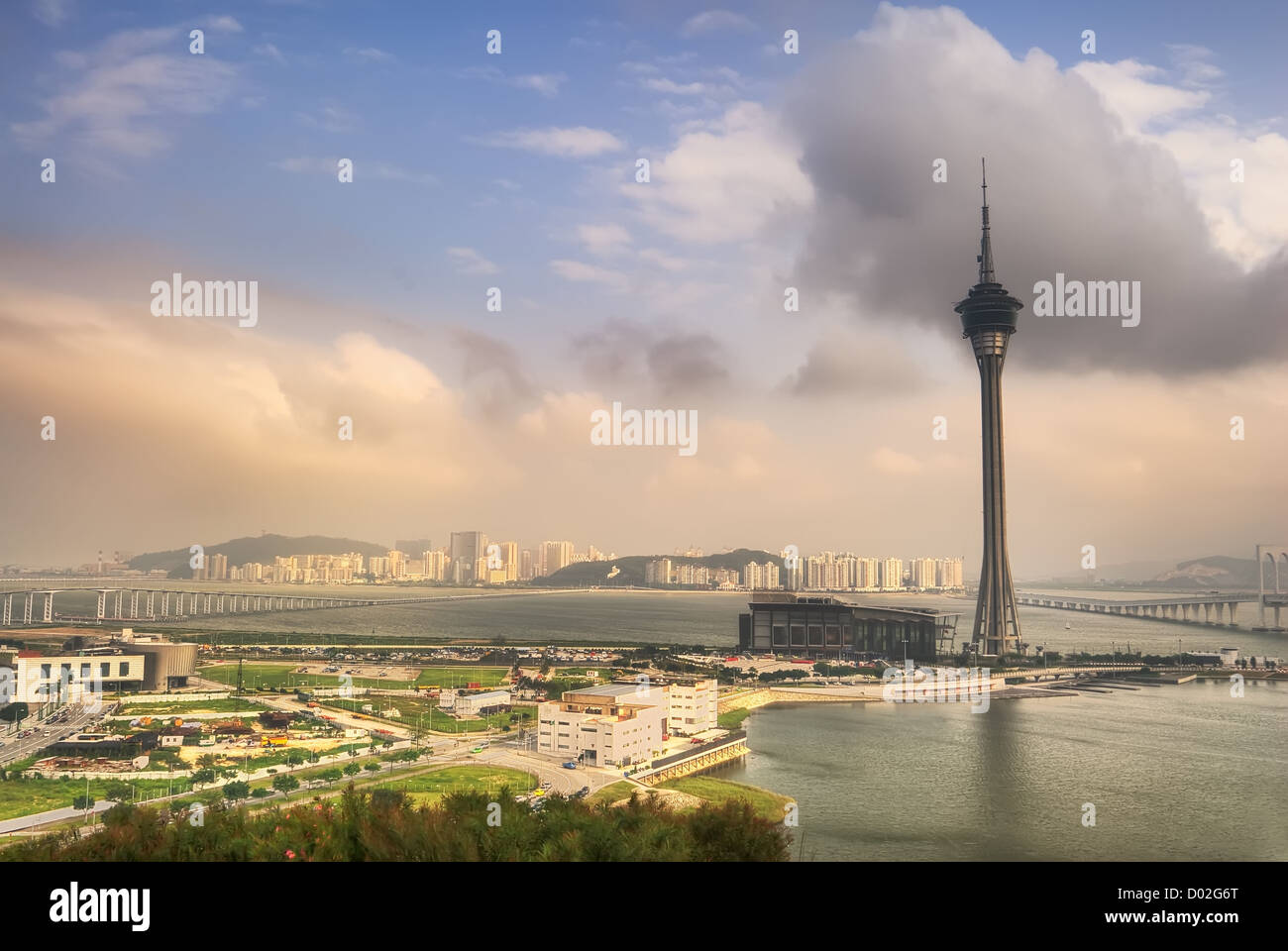 Urban landscape of Macau with famous traveling tower under blue sky ...