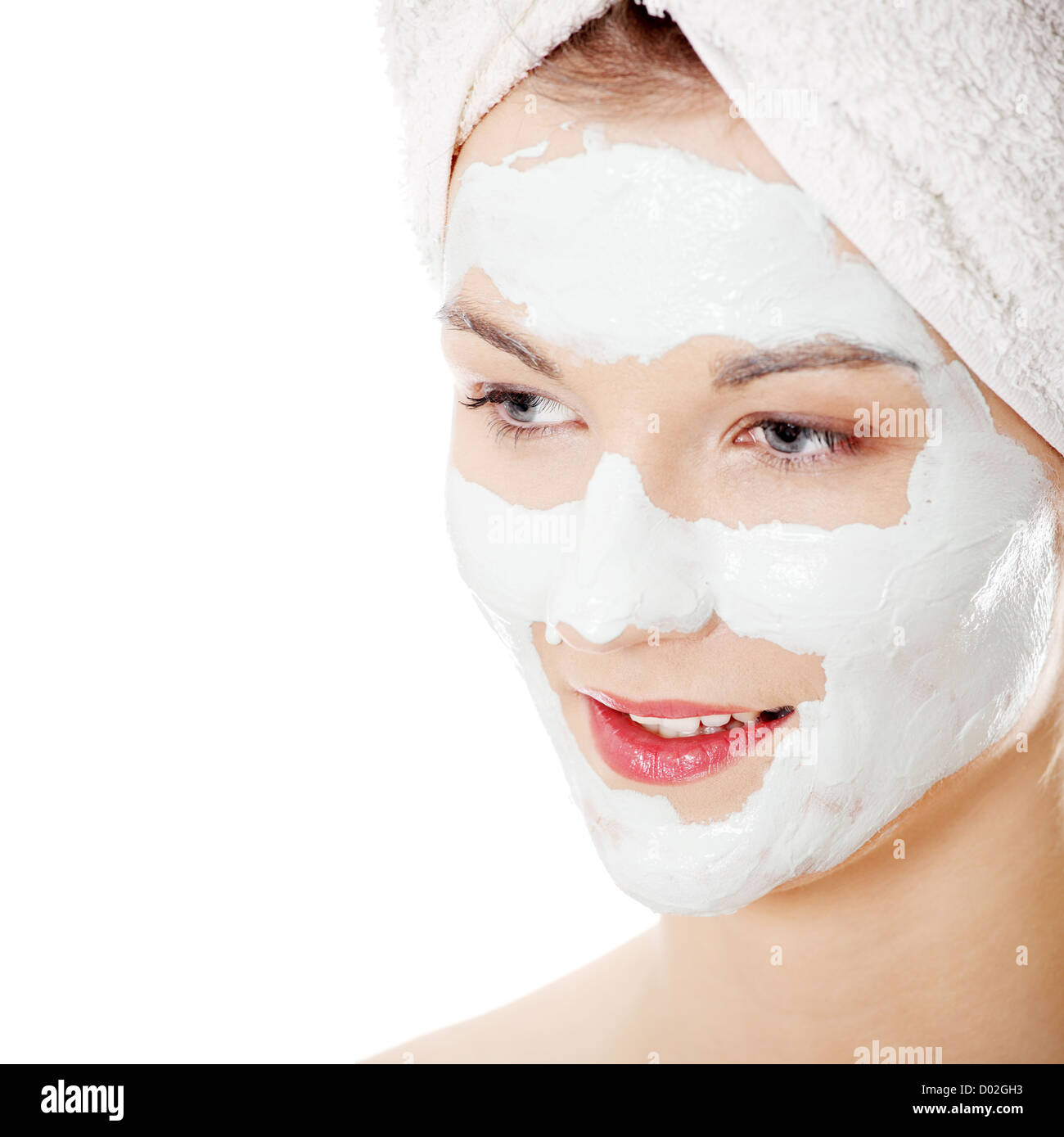 Cosmetics mask of clay on the beautiful young woman face Stock Photo ...