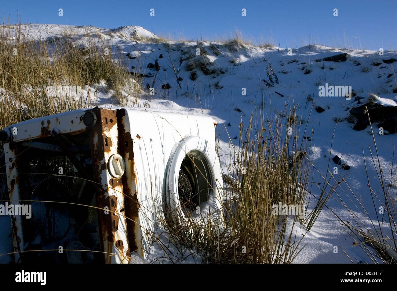A washing machine left in a snowy field Stock Photo - Alamy