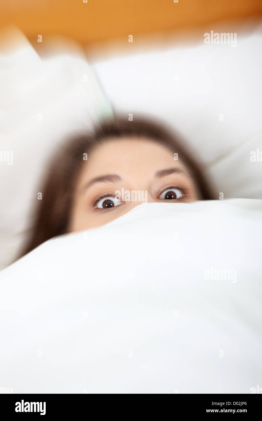 Scared young woman Stock Photo - Alamy