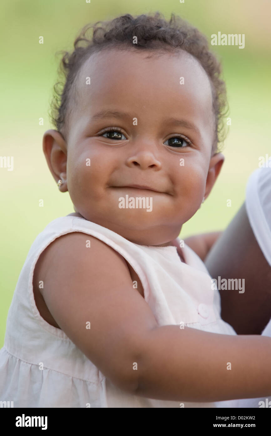 Adorable african baby girl with a beautiful smile Stock Photo - Alamy