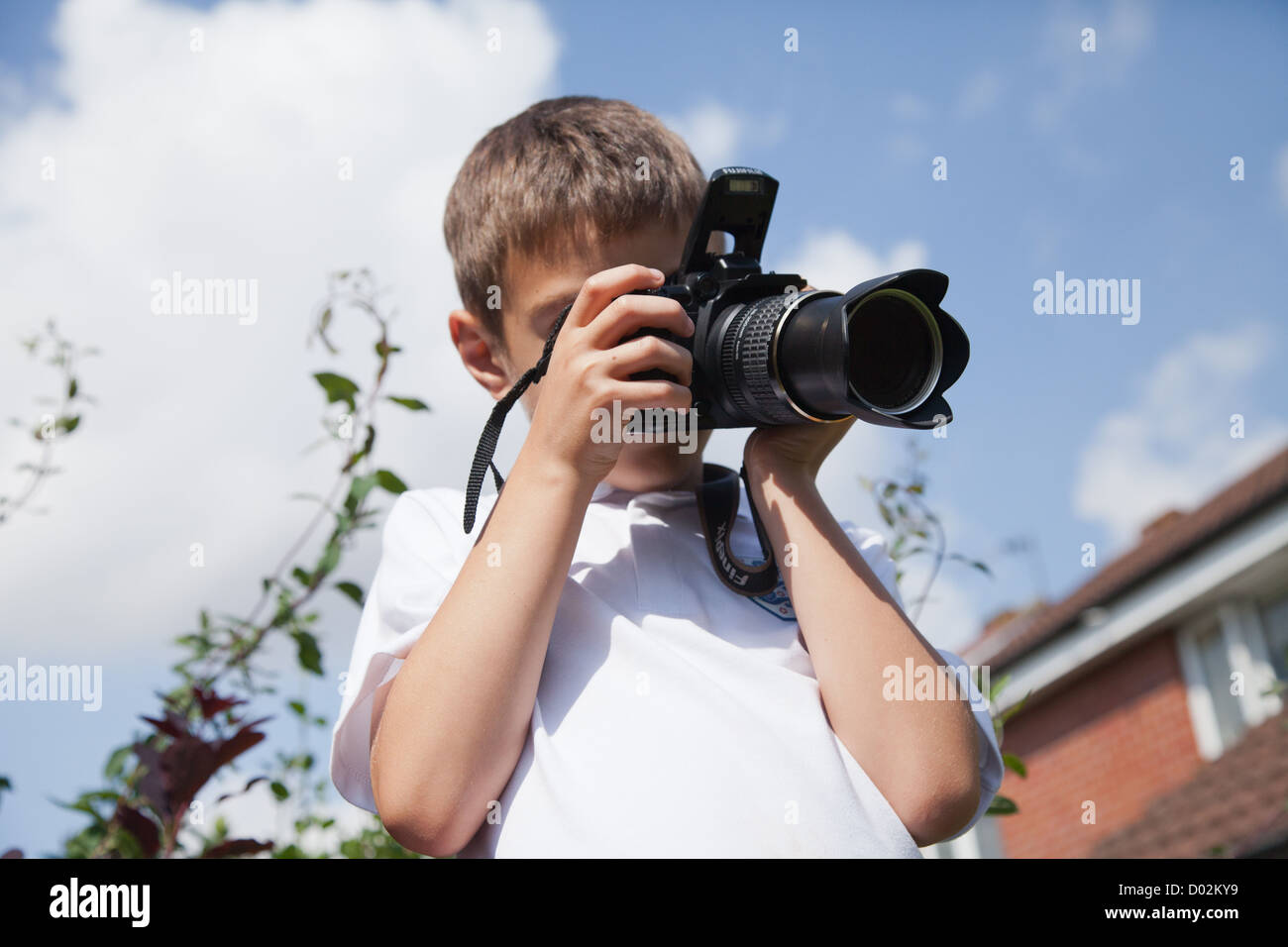 Young photographer taking photographs Stock Photo - Alamy