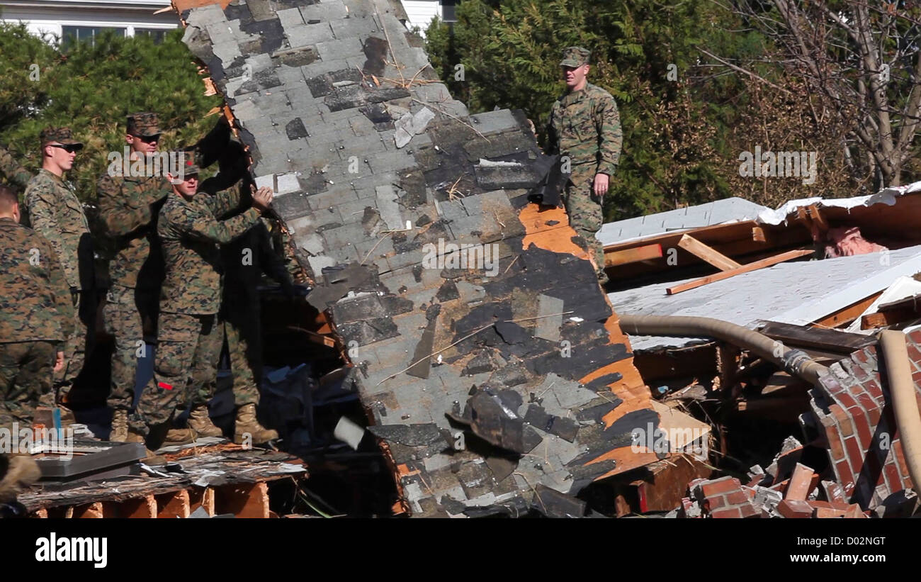Marines assist in cleared debris and helped locals in moving damaged ...