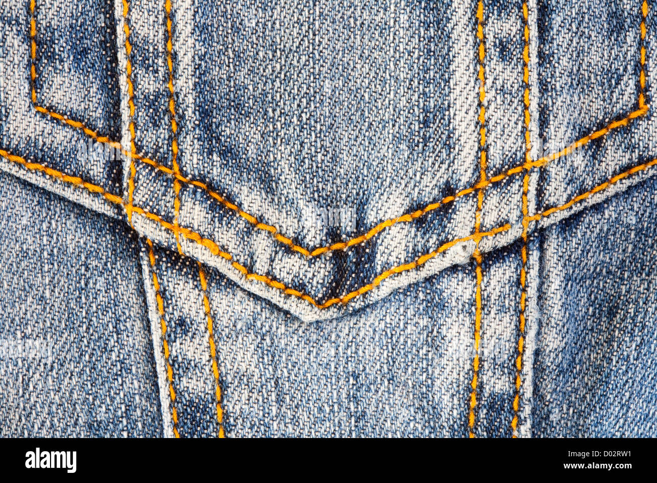 Photo of a pocket jeans with yellow thread Stock Photo - Alamy