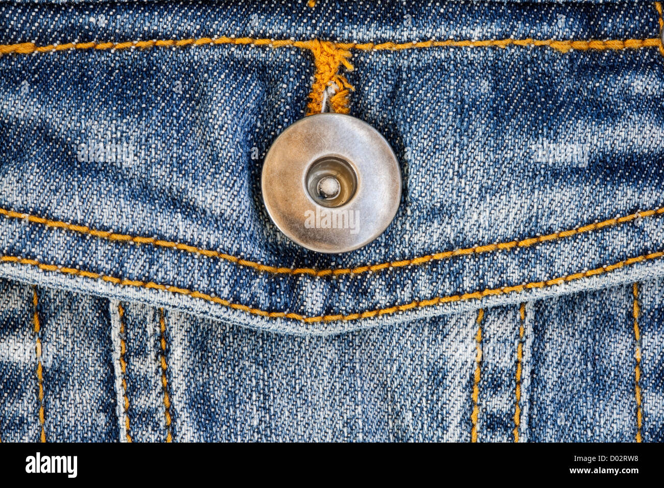 Photo of a pocket jeans with metallic button Stock Photo - Alamy