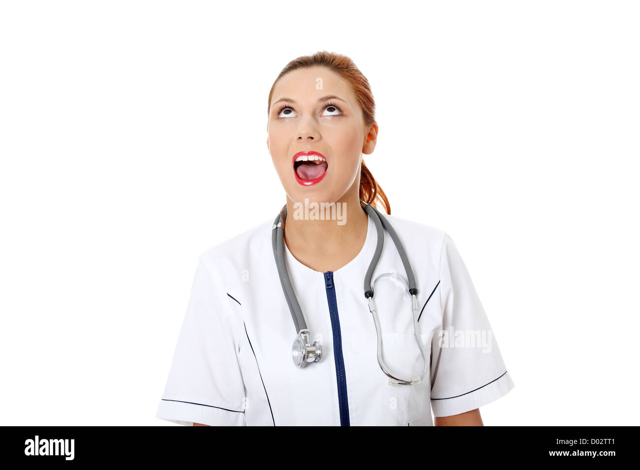 Shocked female doctor or nurse looking up , isolated on white Stock ...