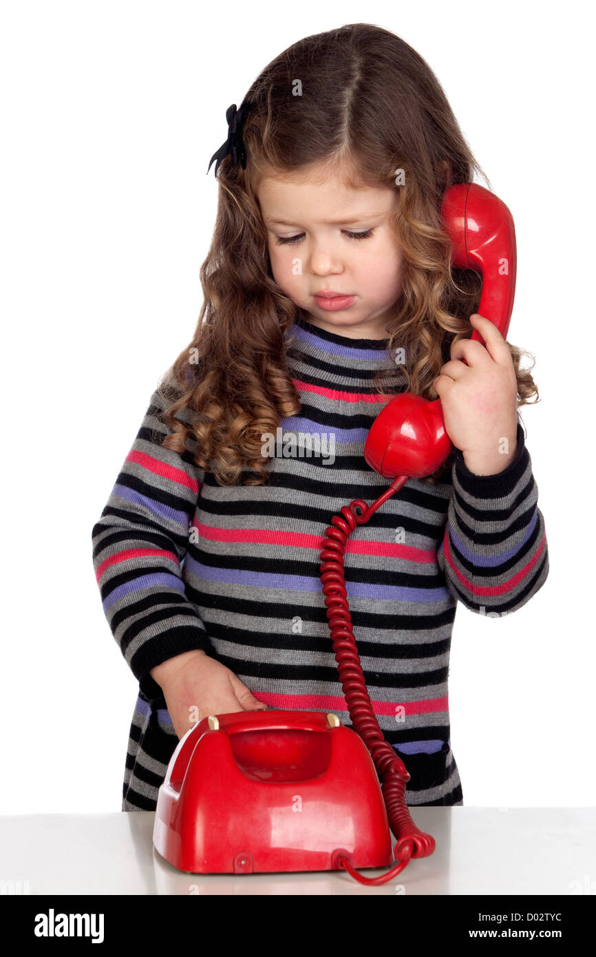 Adorable baby with a red telephone isolated over white background Stock ...
