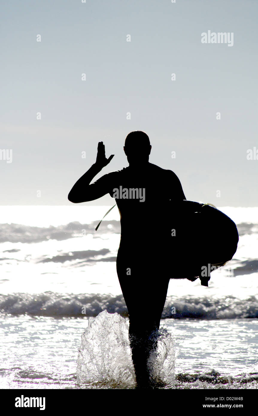 surfing at a nice beach outside at the sea Stock Photo - Alamy