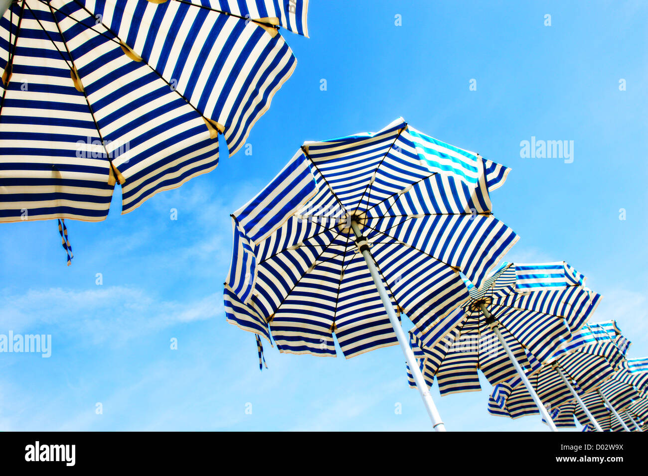 sunshade at the beach on a very sunny day Stock Photo - Alamy