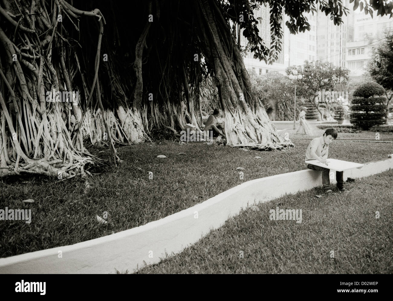 Travel Street Photography - Artist at work in modern Saigon Ho Chi Minh ...