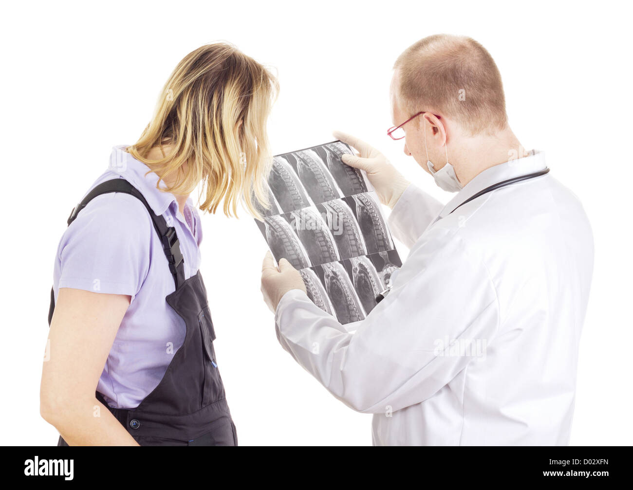 Medical doctor explains patient radiograph Stock Photo - Alamy
