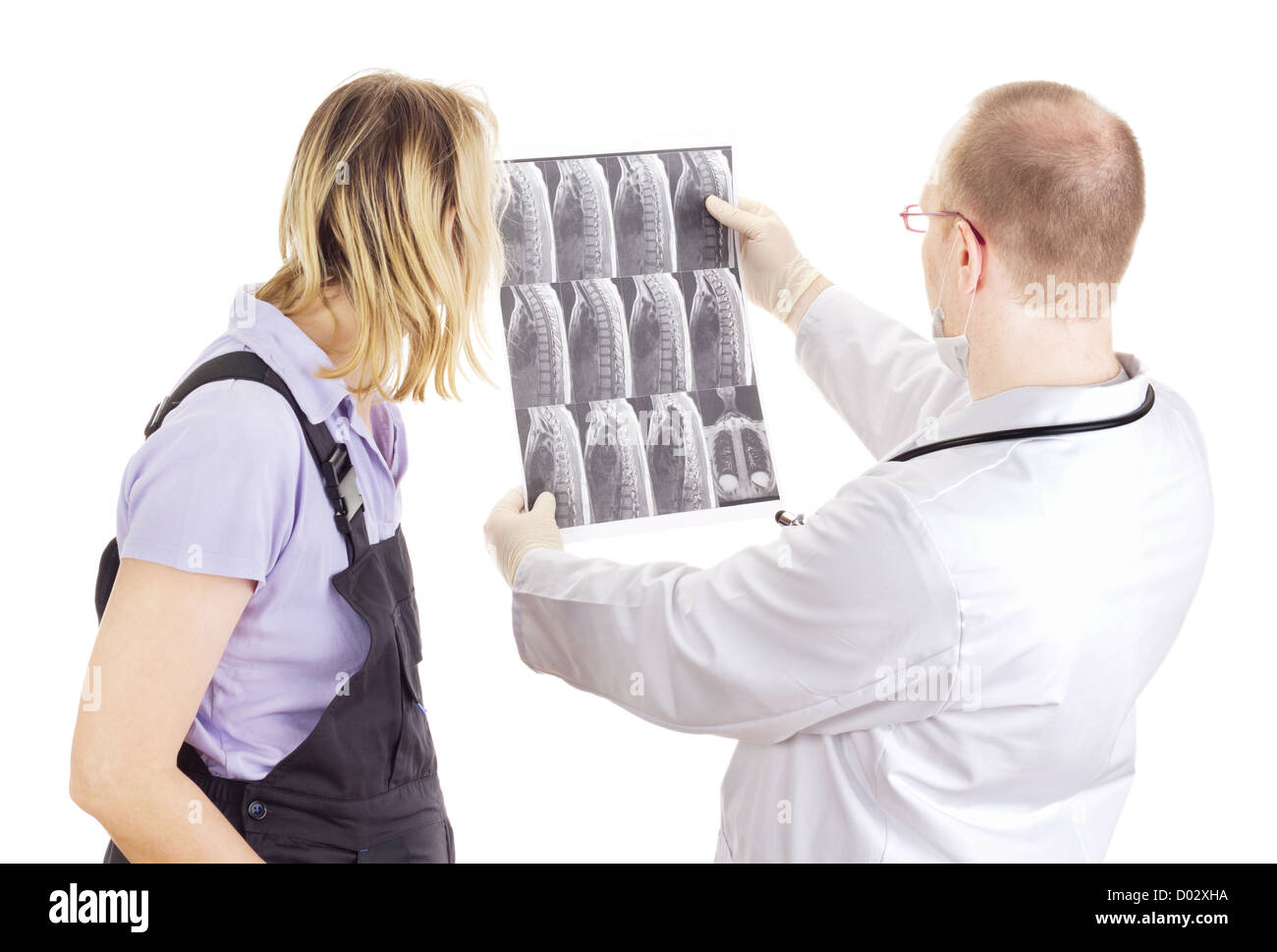 Medical doctor explains patient radiograph Stock Photo - Alamy