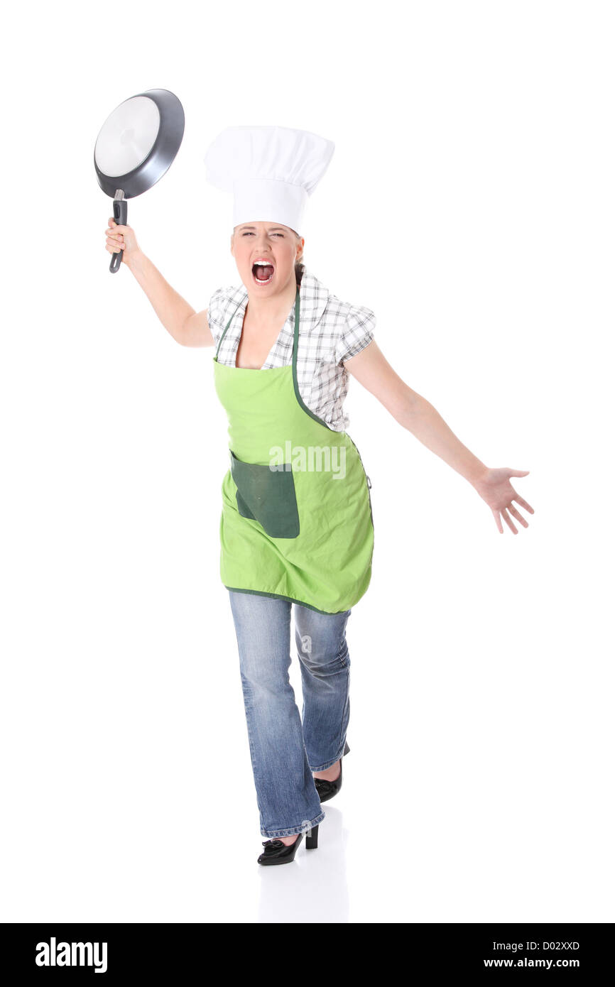 Angry young woman cooking , isolated on white Stock Photo - Alamy
