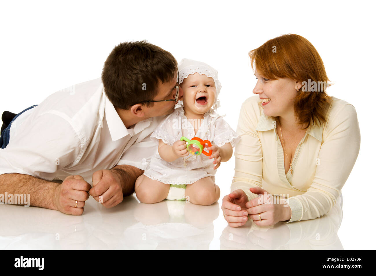 Happy Family of mother father and one year baby isolated Stock Photo ...