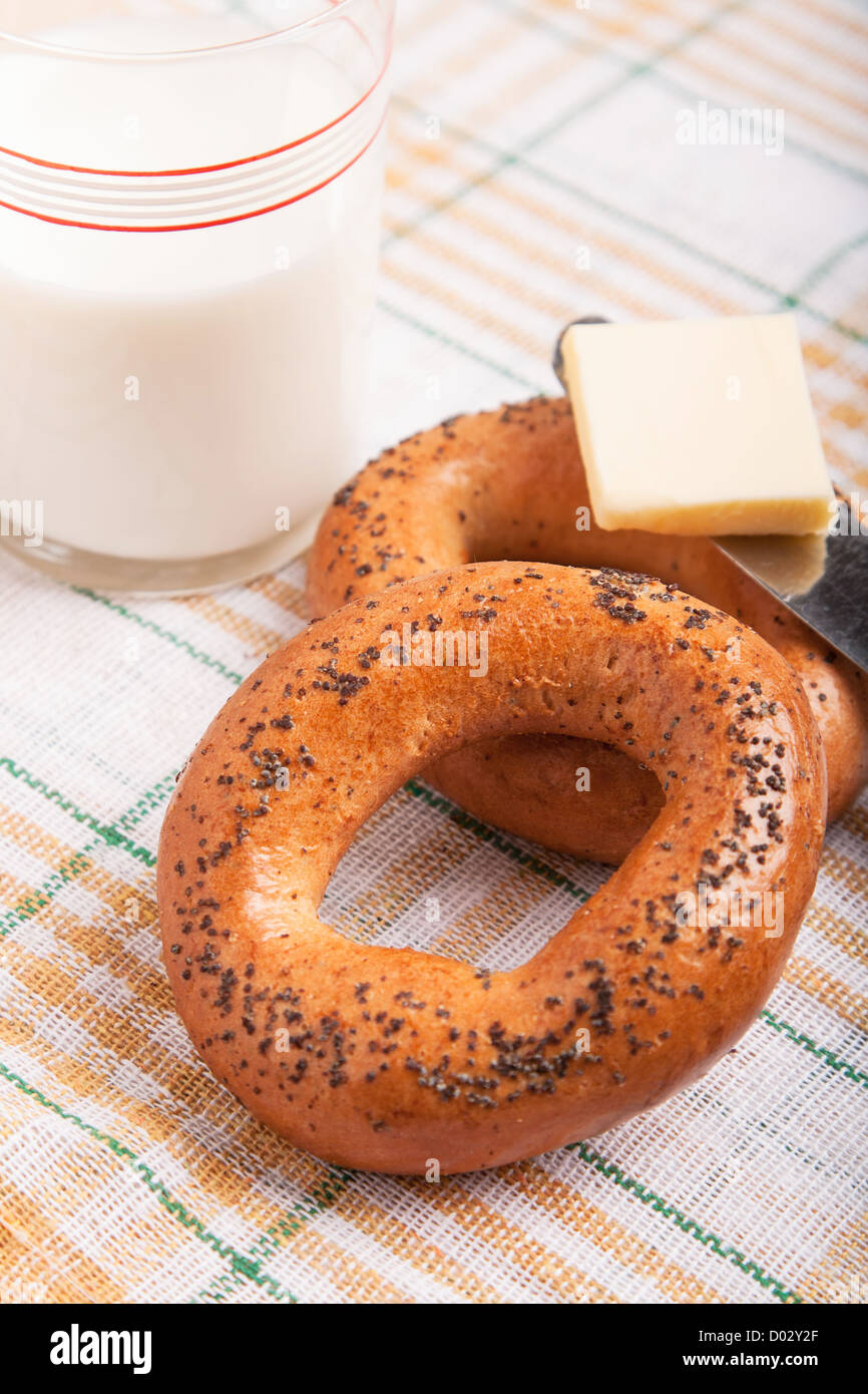 two bread-ring with milk on napkin Stock Photo - Alamy