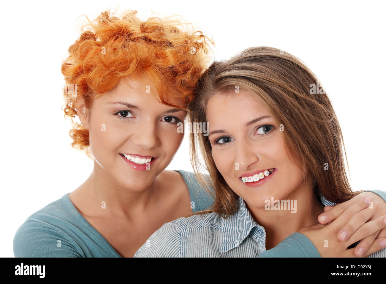 Two pretty girl friends smiling Stock Photo - Alamy