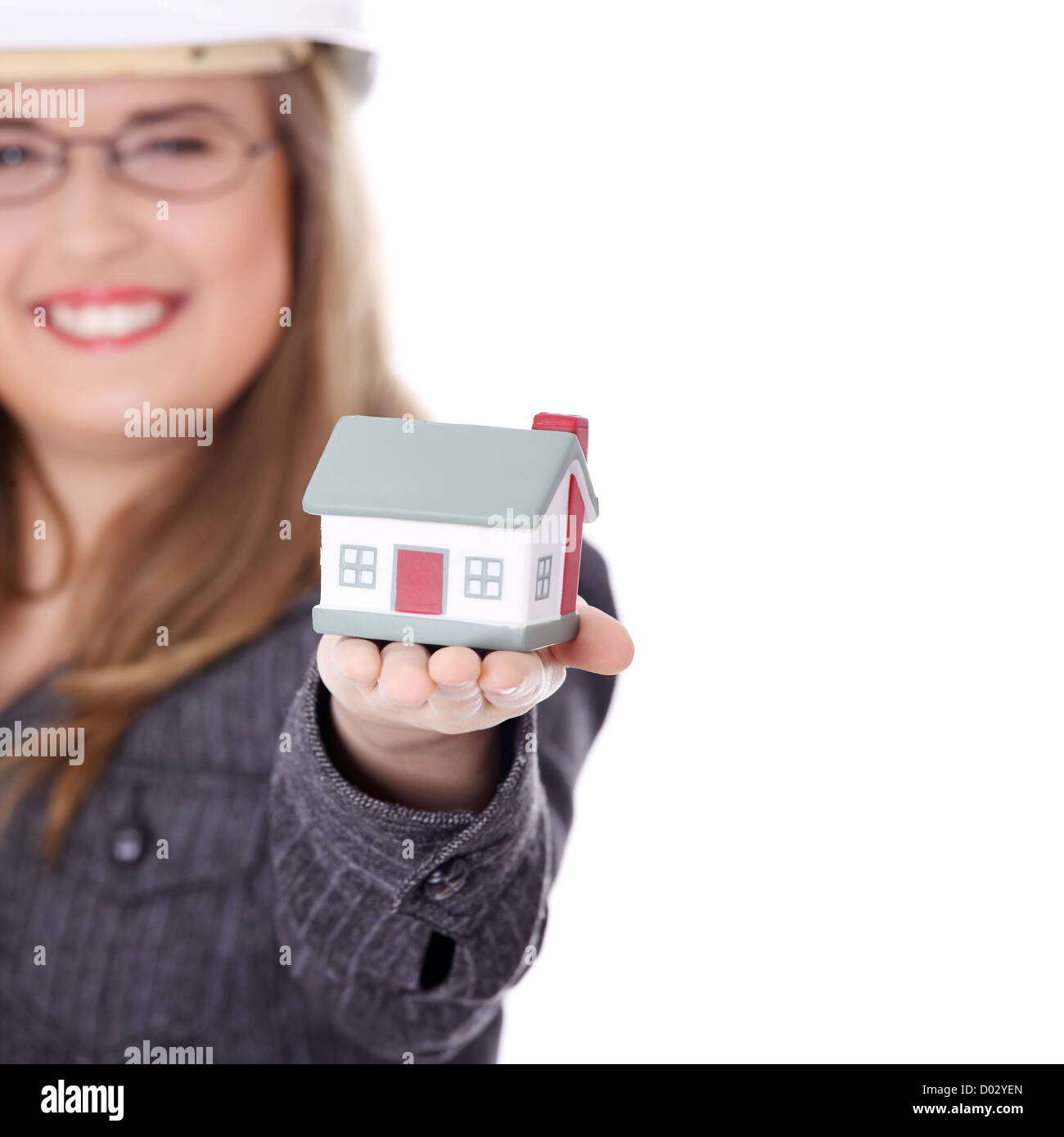 Young beautiful business woman with house model - real estate concept ...