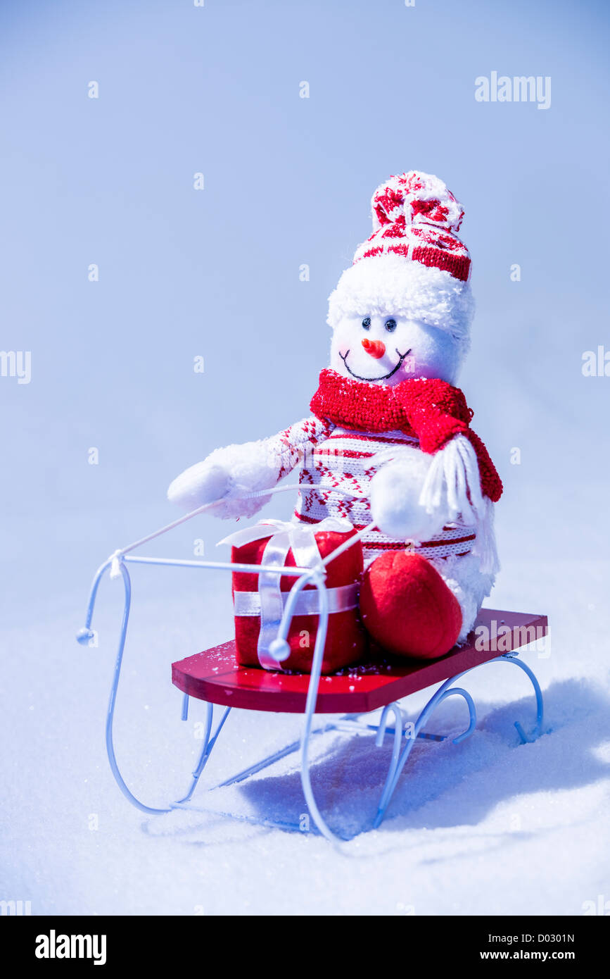 Snowman on sled hi-res stock photography and images - Alamy