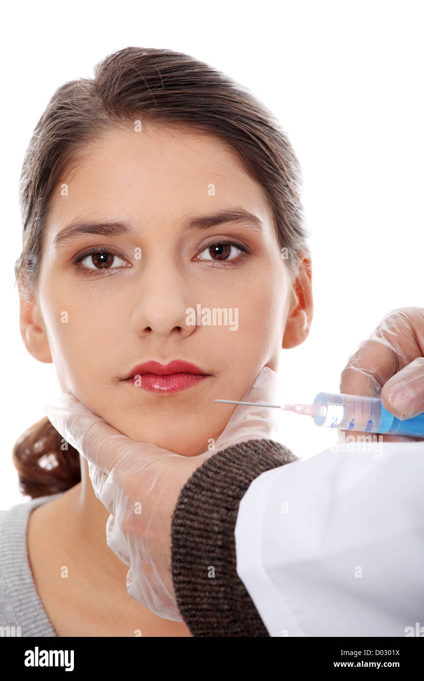 Plastic surgeons giving botox injection Stock Photo - Alamy