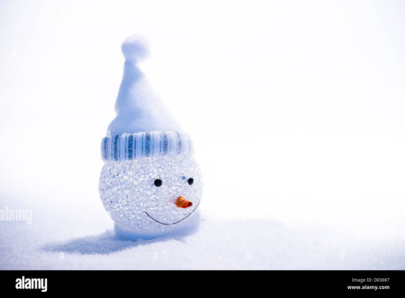 Snowman's smiley face in winter landscape. Snowy Christmas time. Copy ...