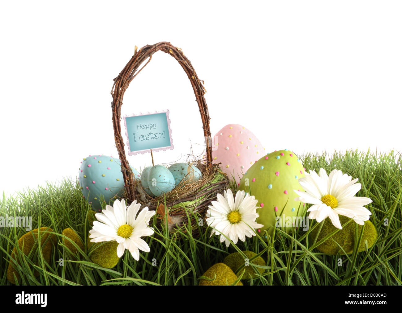 Easter eggs with basket in the grass Stock Photo - Alamy