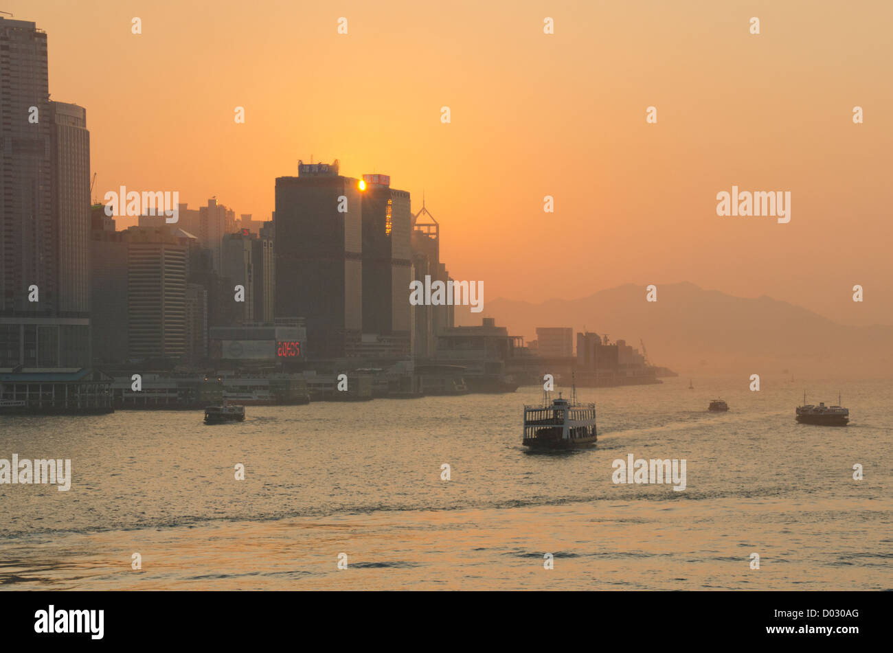 China, Hong Kong. Sunset view of Honk Kong Island from Victoria Harbor & Kowloon Stock Photo - Alamy
