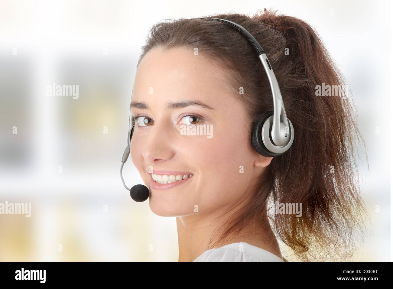 Young call center worker Stock Photo - Alamy